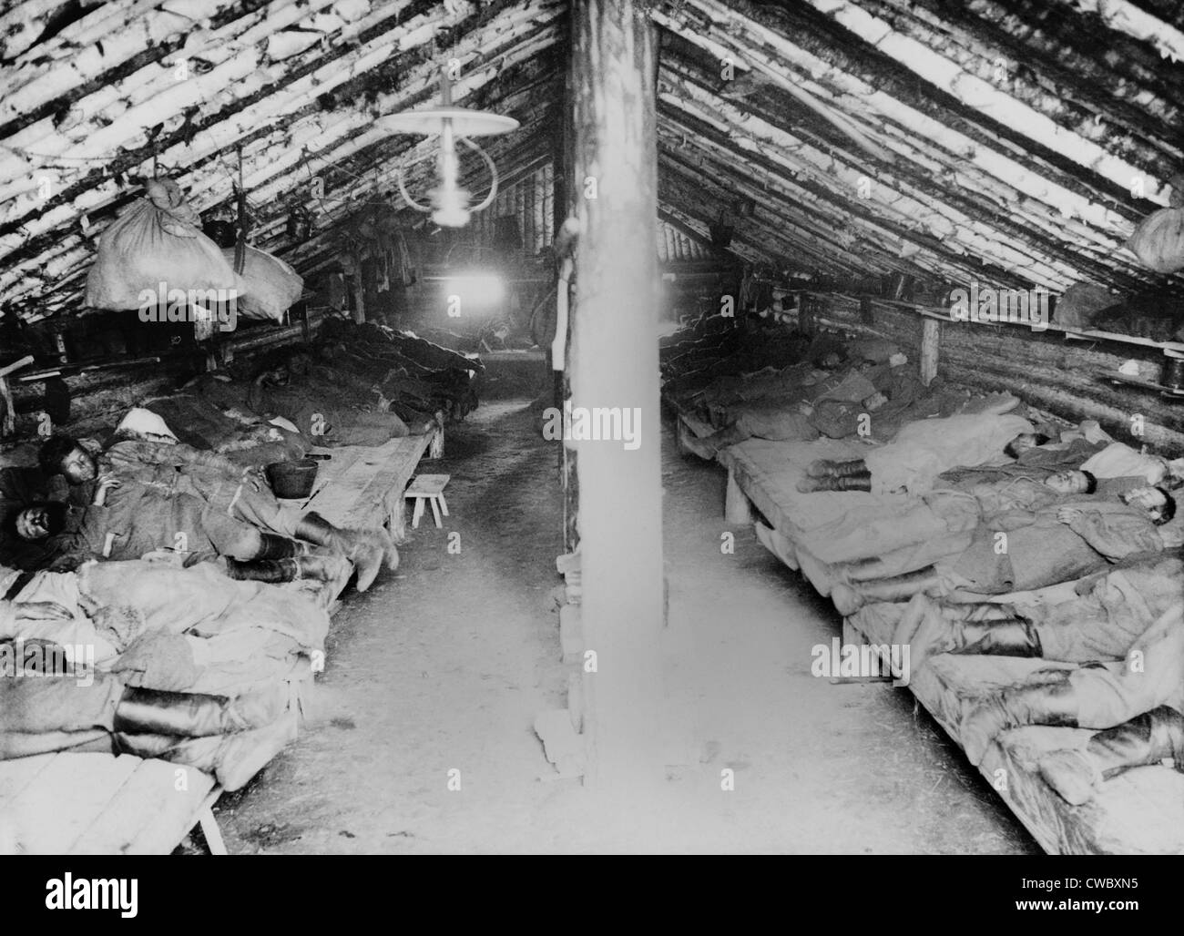 Russian convicts' sleeping quarters in a primitive Siberian prison camp ...