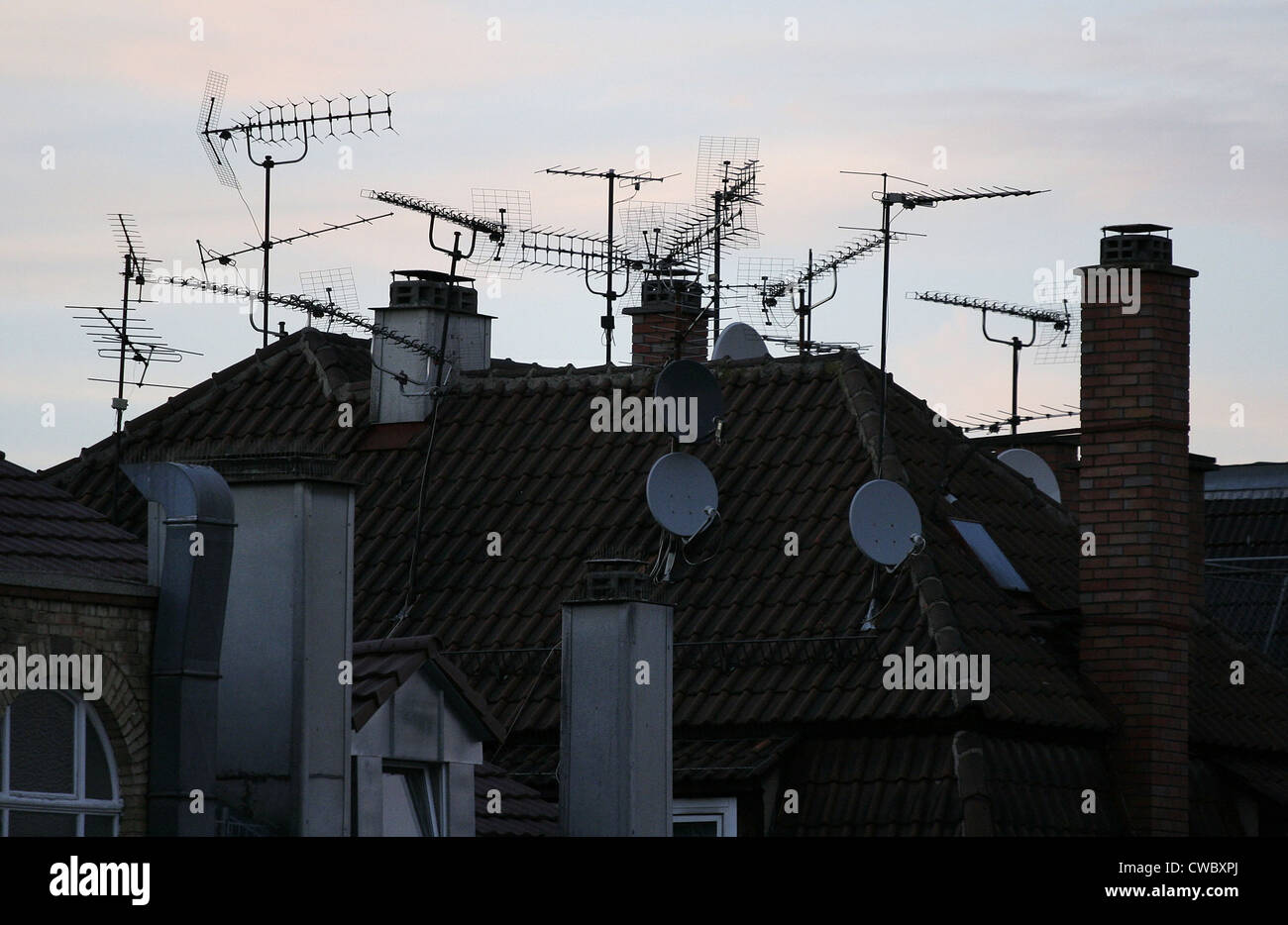 Antennas on a rooftop Stock Photo - Alamy