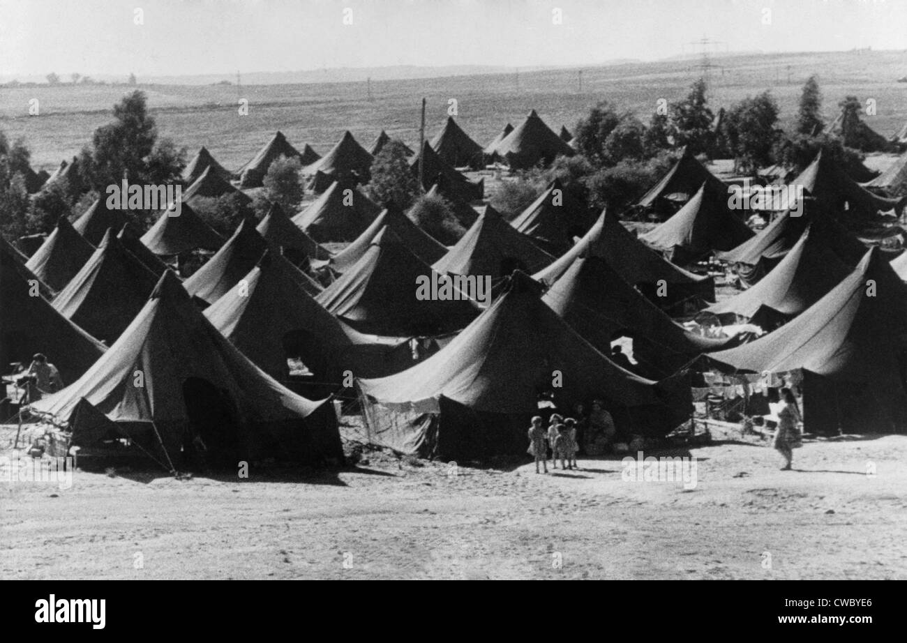 Tents used as temporary housing for Jewish immigrants in Israel. From ...