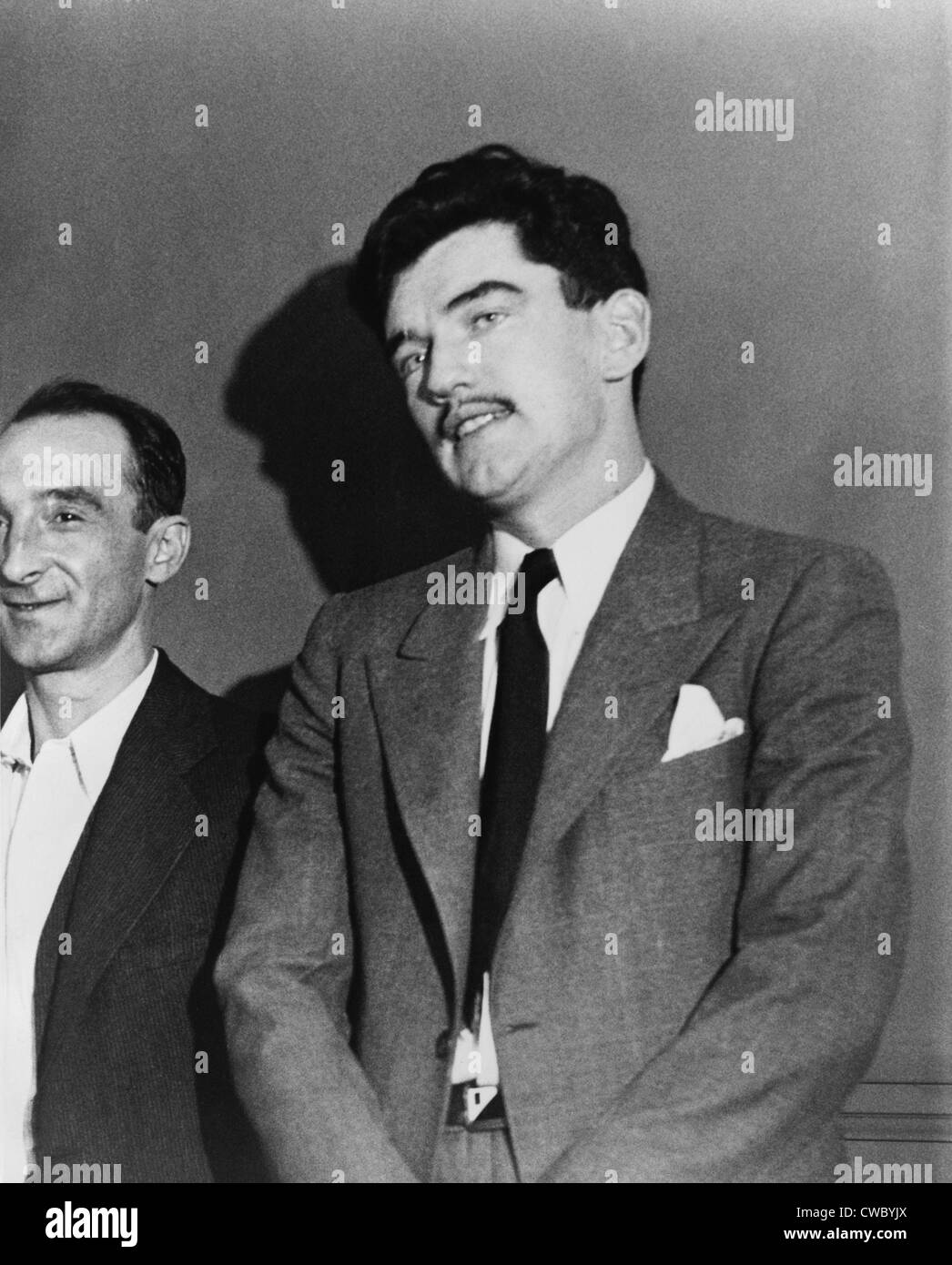 Gangster Vincent Coll, at the Bathgate Police Station, Bronx, New York ...