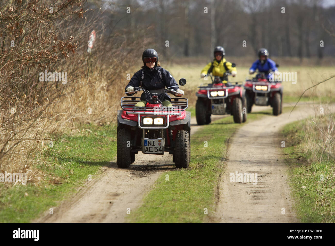 Quad biking in terrain Stock Photo - Alamy