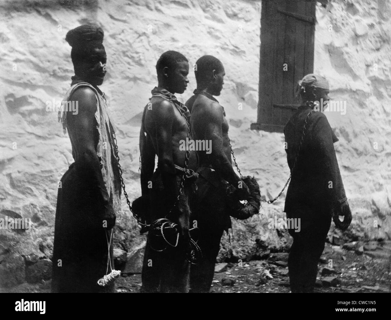 Chain gang of convicts in Monrovia Liberia. Ca. 1895 Stock Photo - Alamy