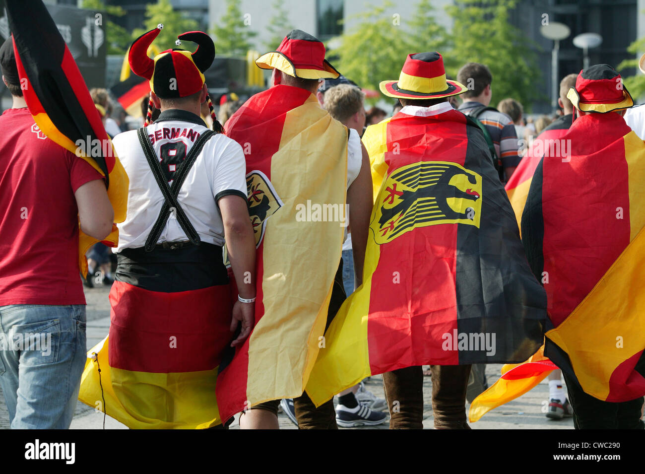 Berlin, football fans with flags frame covered on the way back Stock ...