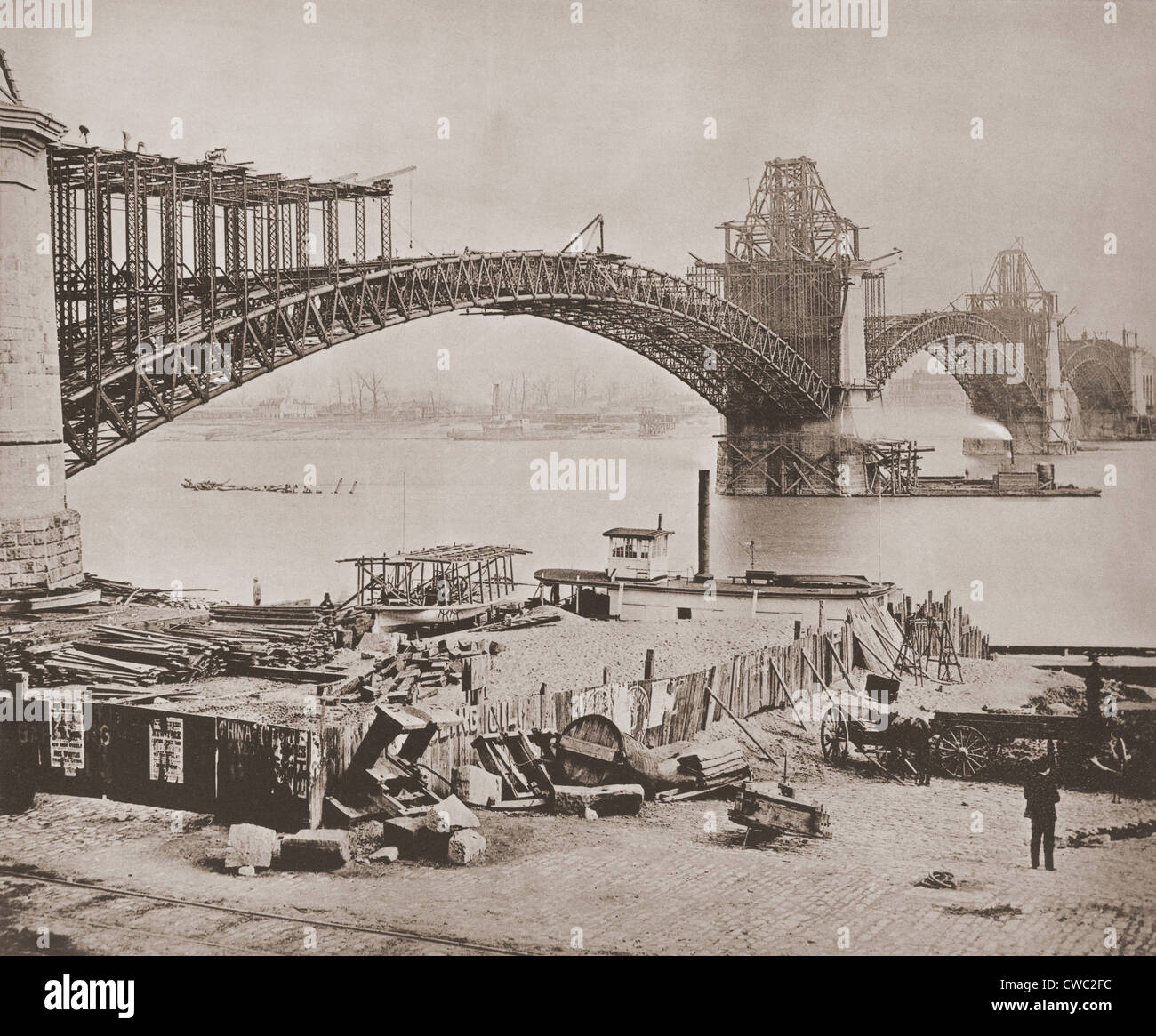 St. Louis Bridge under construction ca. 1870. The steel arches were ...
