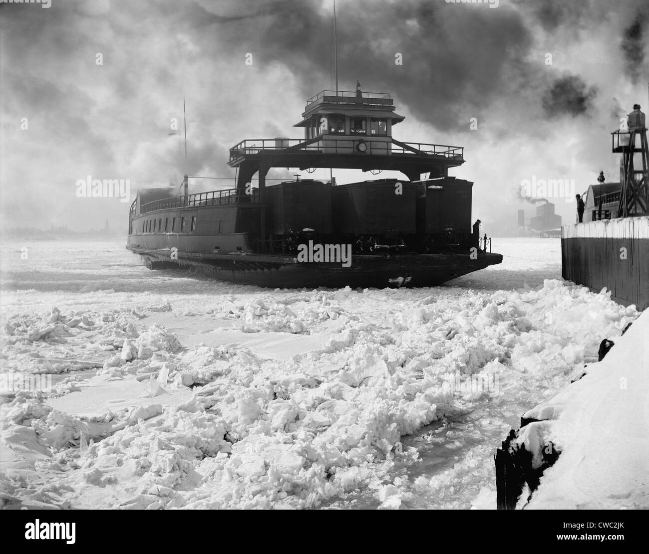 Boxcar ferry of the Michigan Central Railroad entering an iced up slip ...