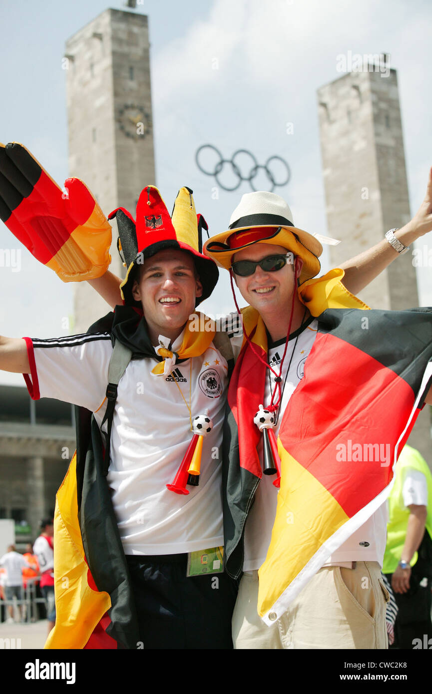 Berlin, two German football fans before the Olympic Stadium Stock Photo ...
