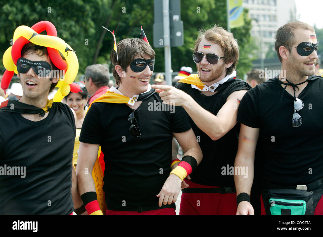 Berlin, German football fans dressed as Batman Stock Photo - Alamy