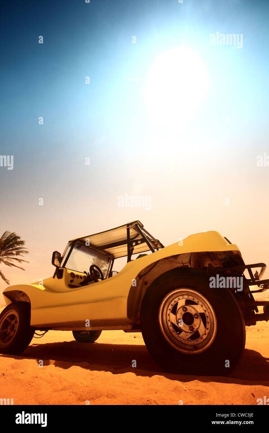desert buggy in desert sand under blue sky Stock Photo - Alamy