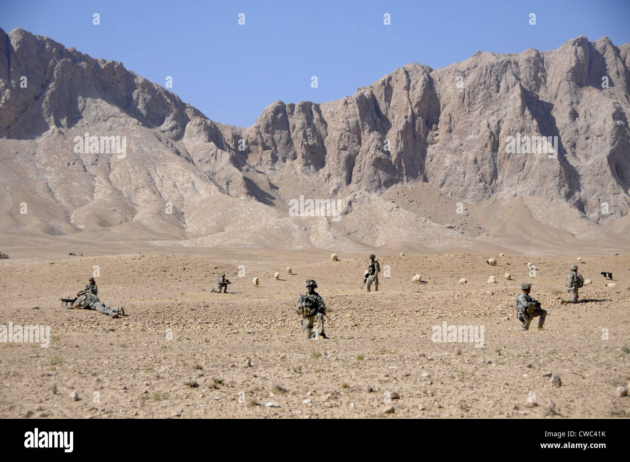 U.S. Soldiers with take a security halt during a patrol off Highway 1 ...