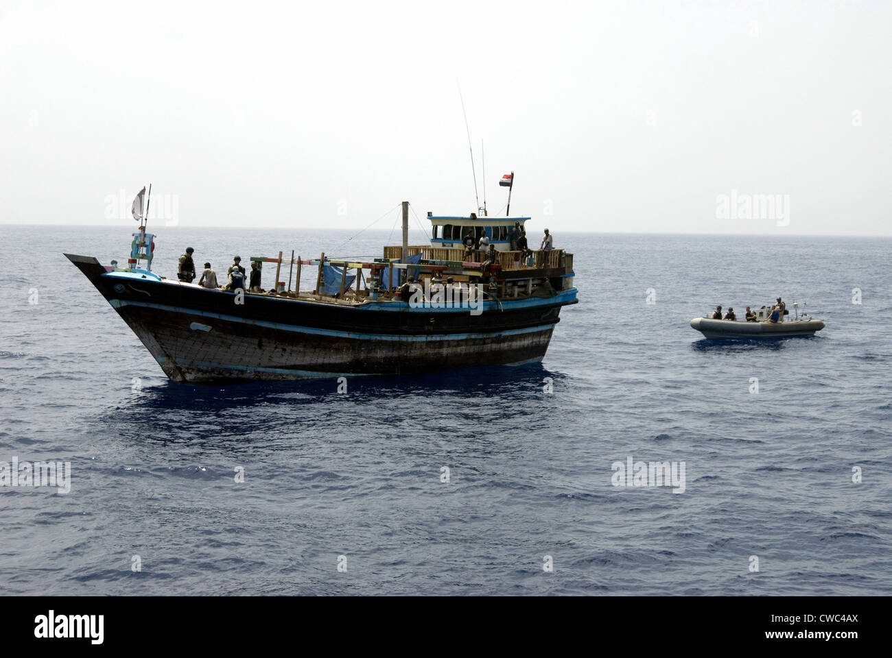 U.S. Navy and Coast Guard counter piracy personnel interview passengers ...
