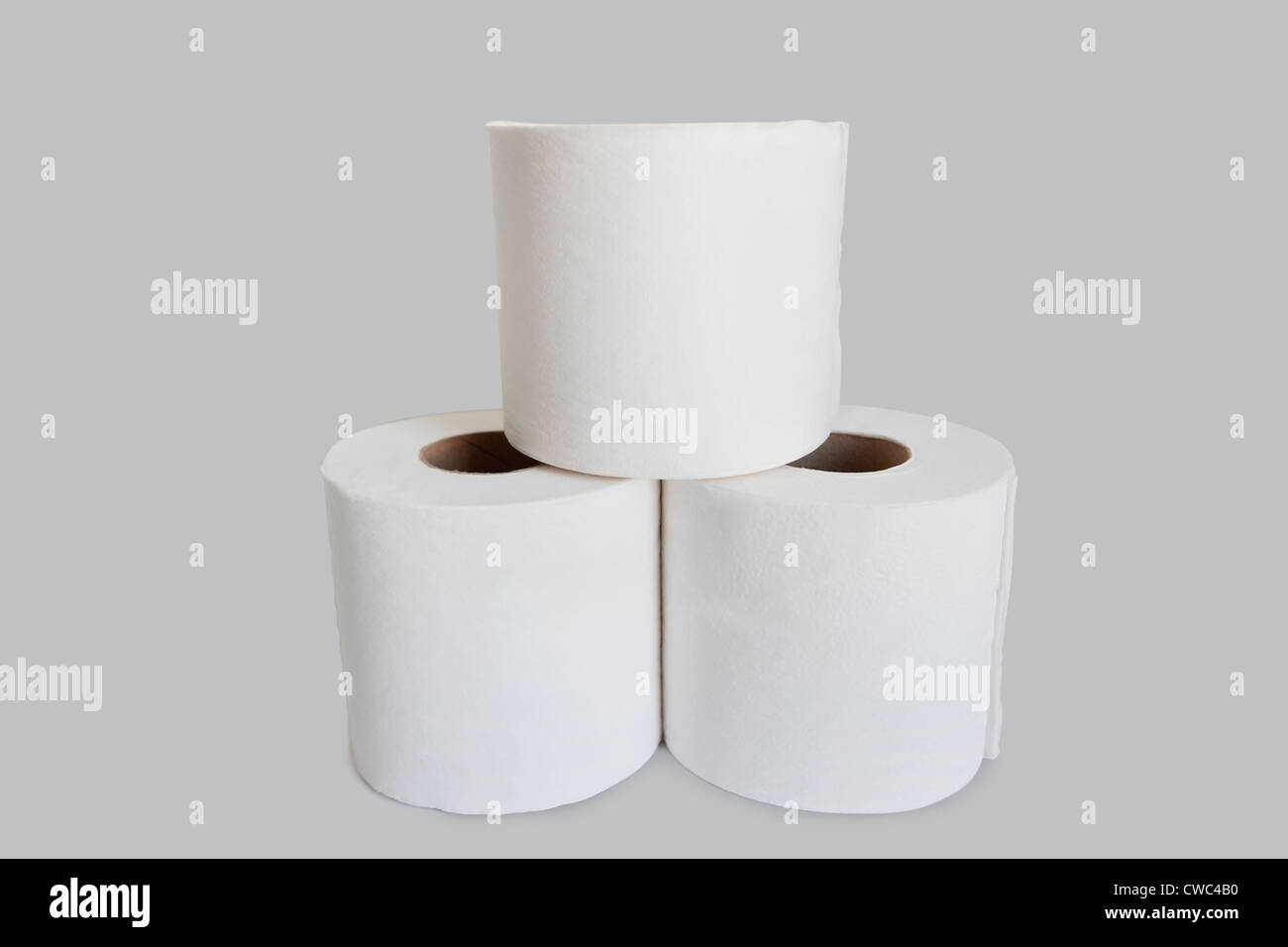 Close-up view of toilet paper stack on white background Stock Photo - Alamy