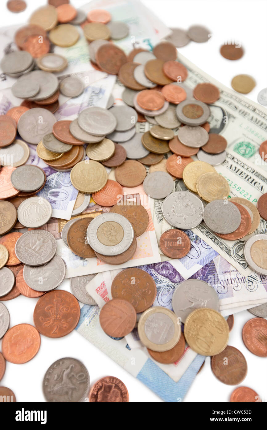Close-up of paper currencies and coins Stock Photo - Alamy