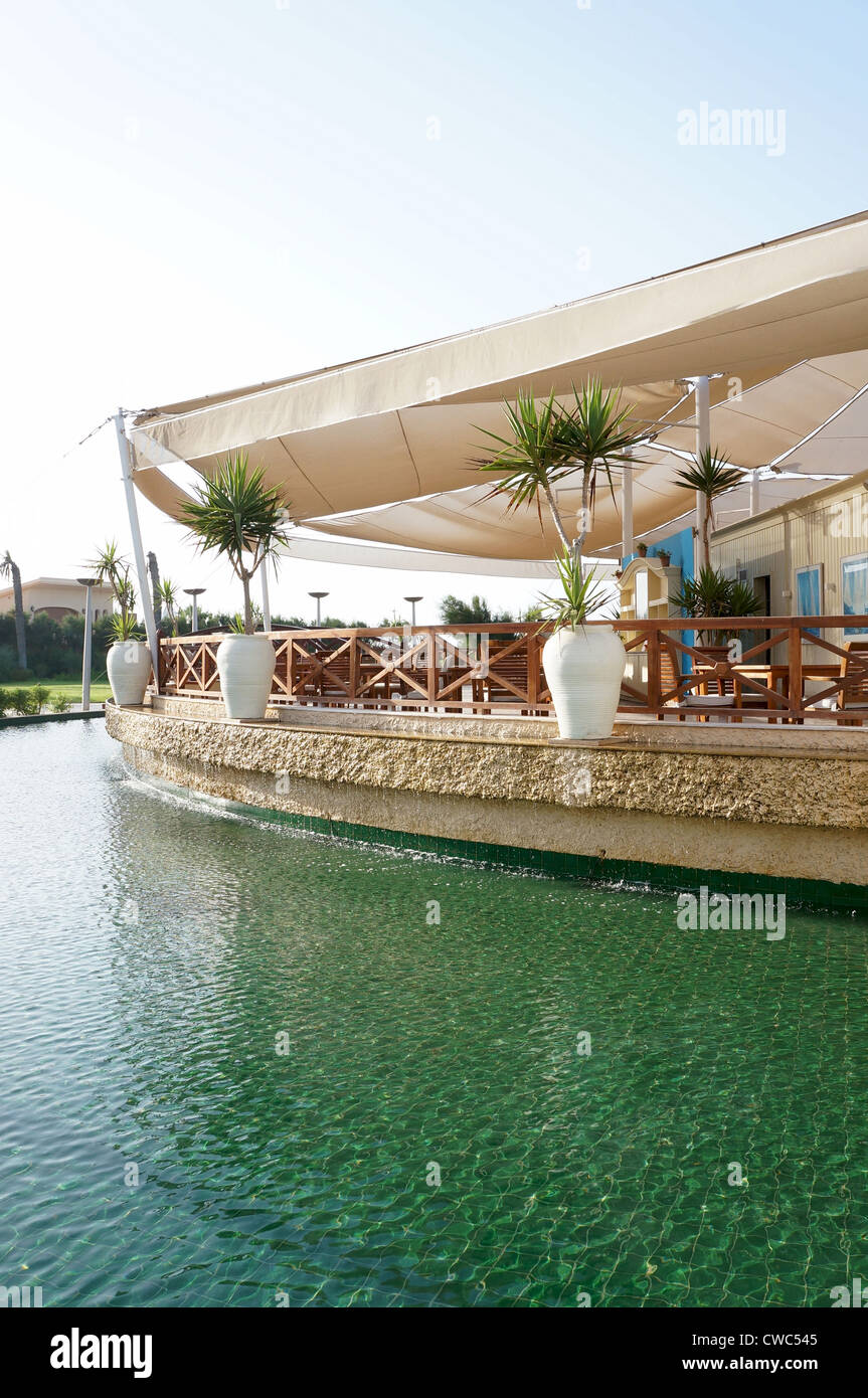 Outdoor view of a bar placed over the water Stock Photo - Alamy