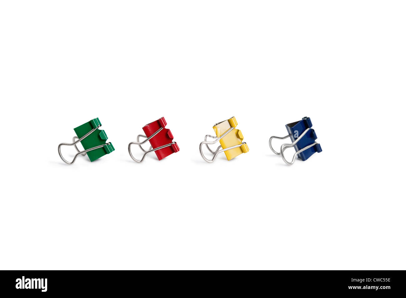 Multicolored bulldog clips over white background Stock Photo - Alamy