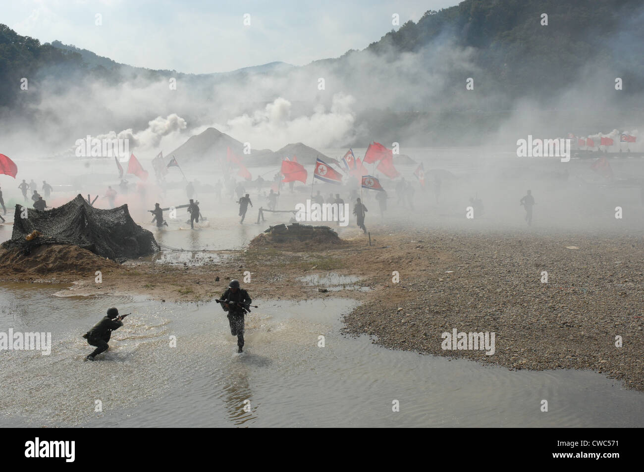 South Korean soldiers dressed as North Korean infantry charge South ...