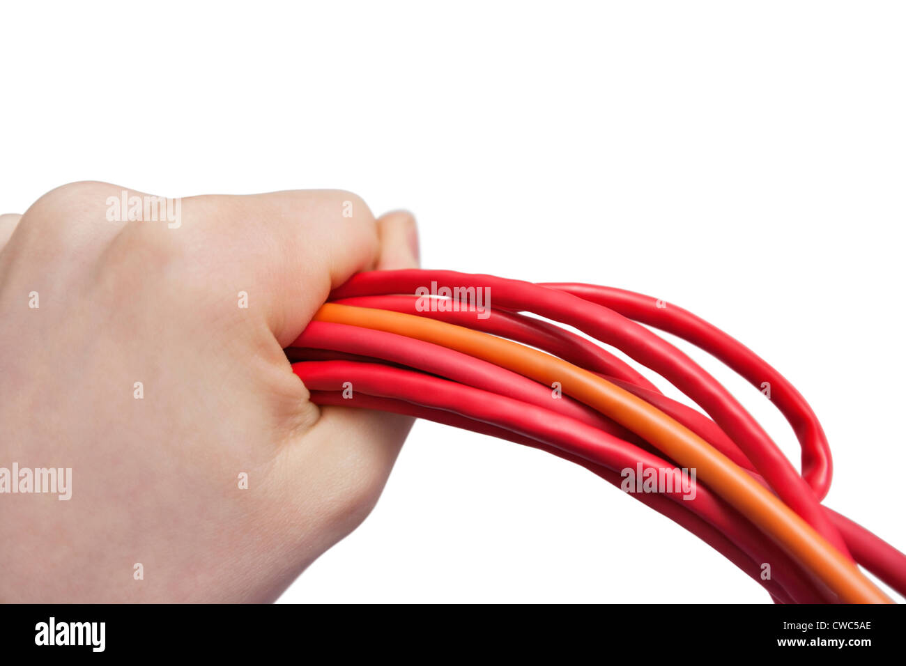 Cropped image of technician holding computer hardware cables over white ...