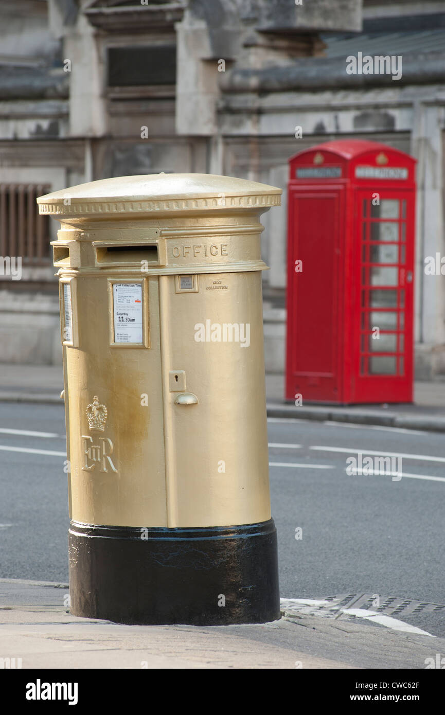 Post Office pillar (post/mail) box in central London painted gold to ...
