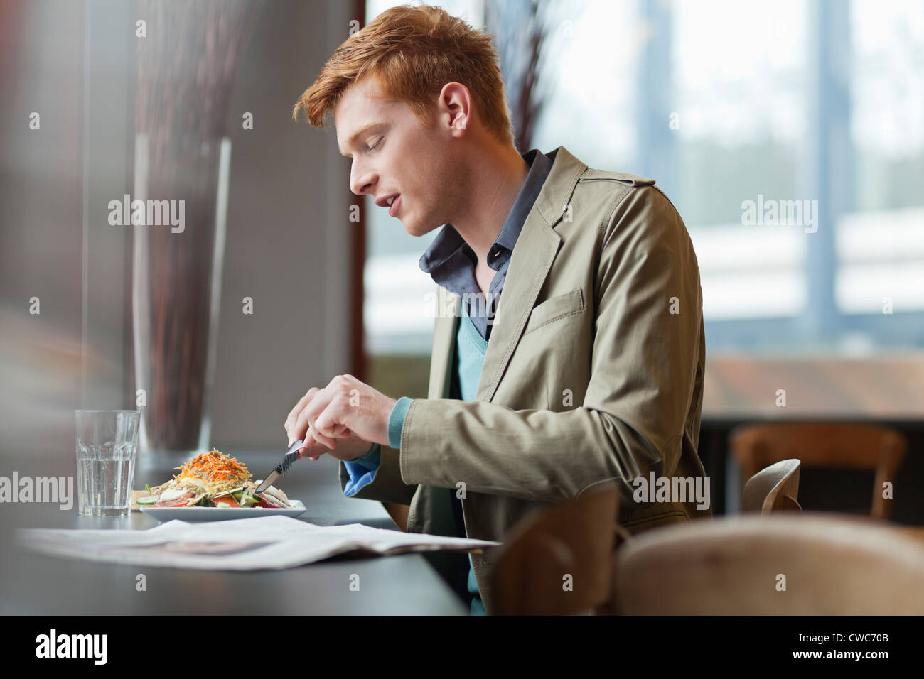 Man sitting down for a meal hi-res stock photography and images - Alamy