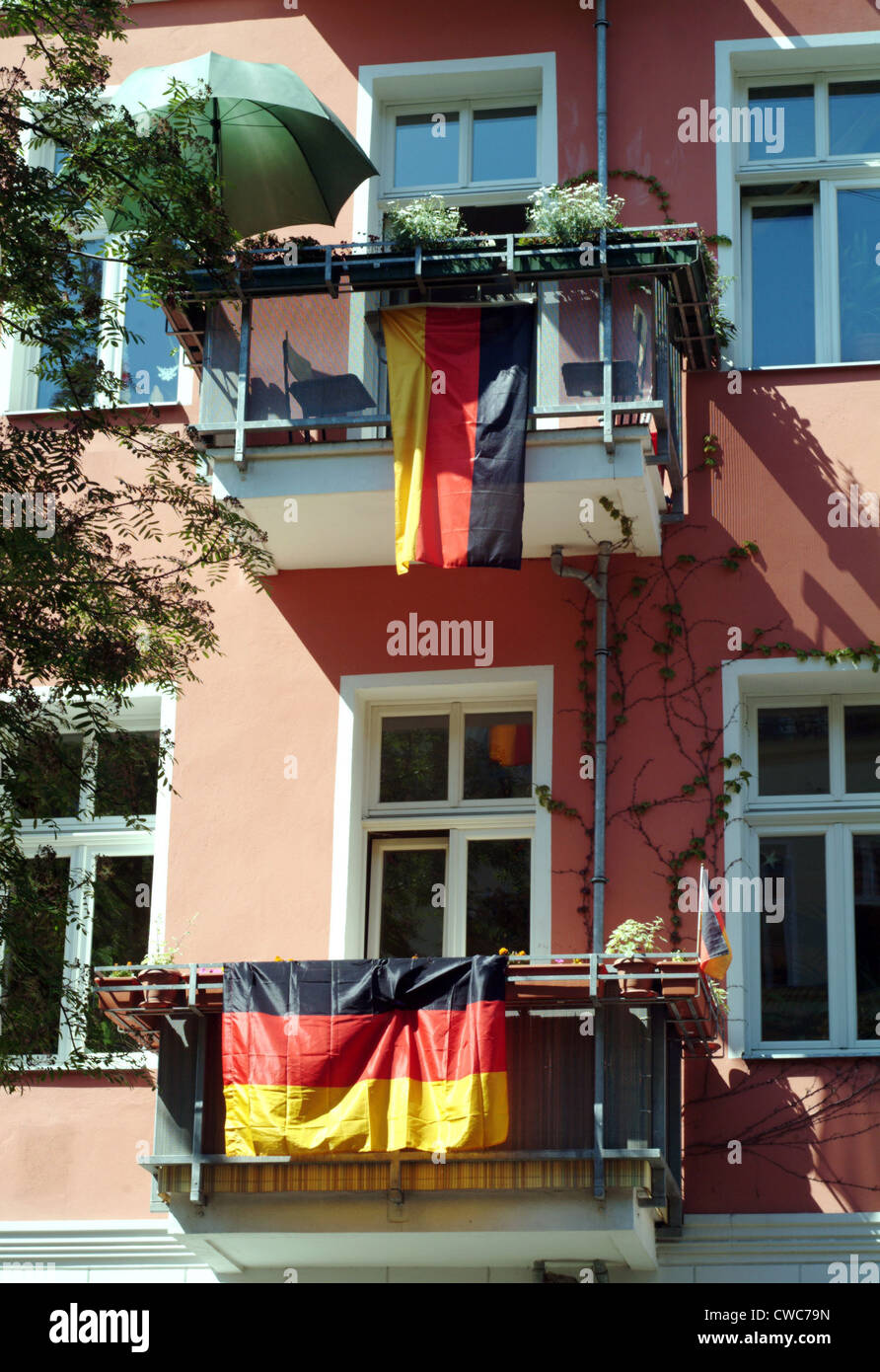 Berlin, Germany flags hanging from a tenement Stock Photo - Alamy