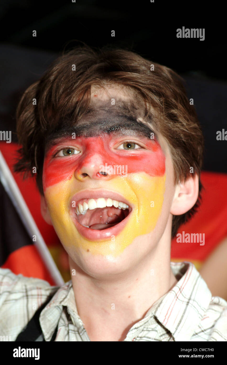 Berlin, with young German national colors on his face Stock Photo - Alamy