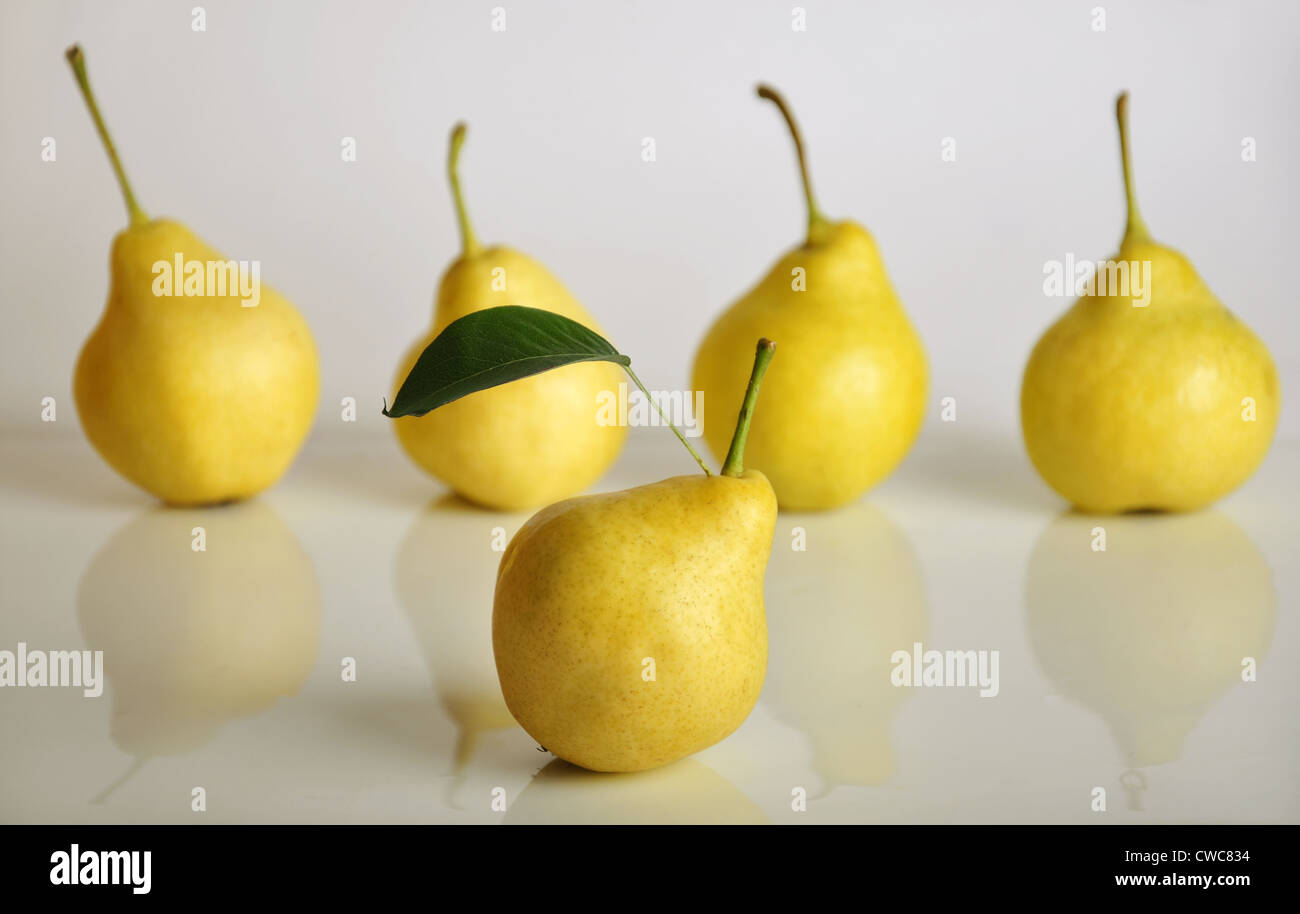 Rip fresh pears on light background Stock Photo - Alamy