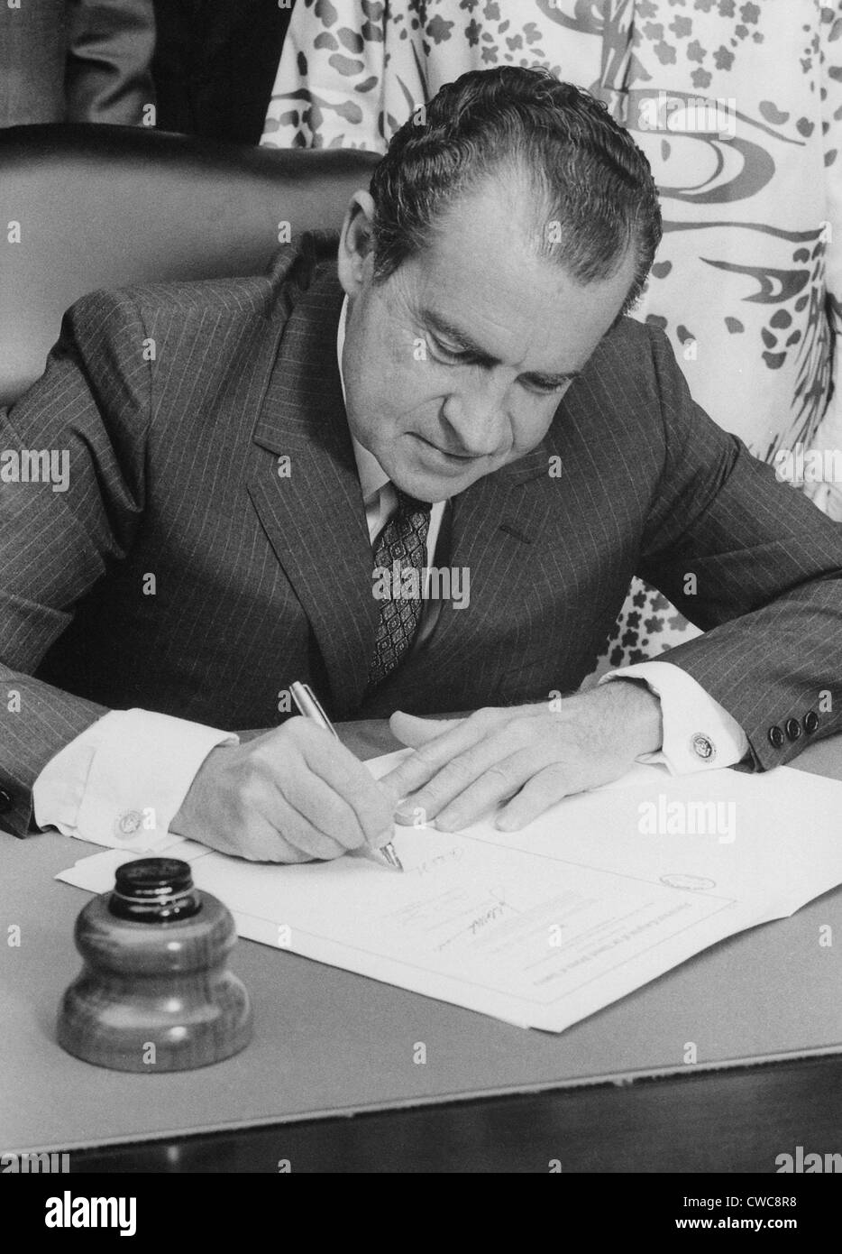 Richard Nixon signing a bill into law. Ca. 1969-74 Stock Photo - Alamy