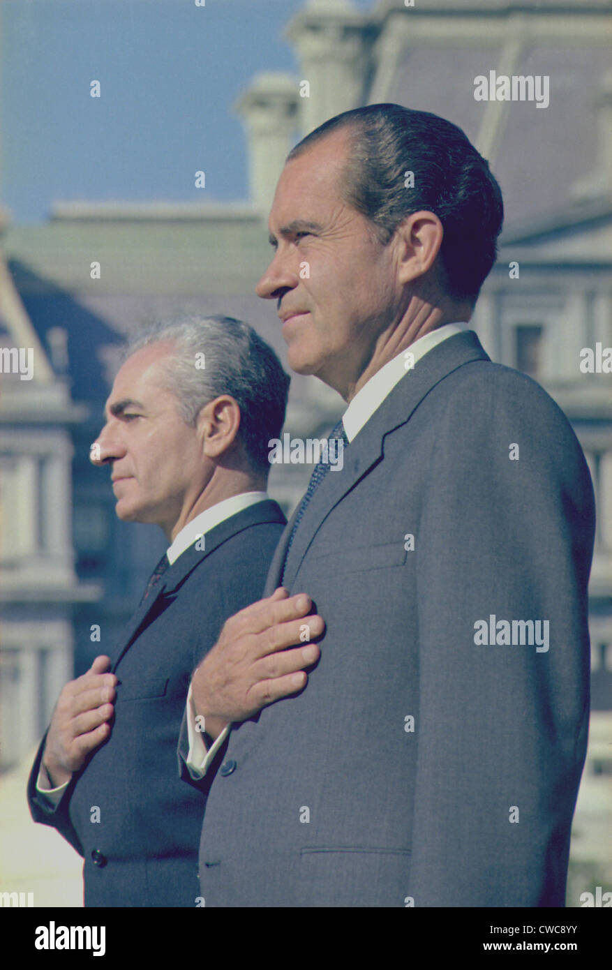 President Nixon and the Shah of Iran stand at his White House arrival ...