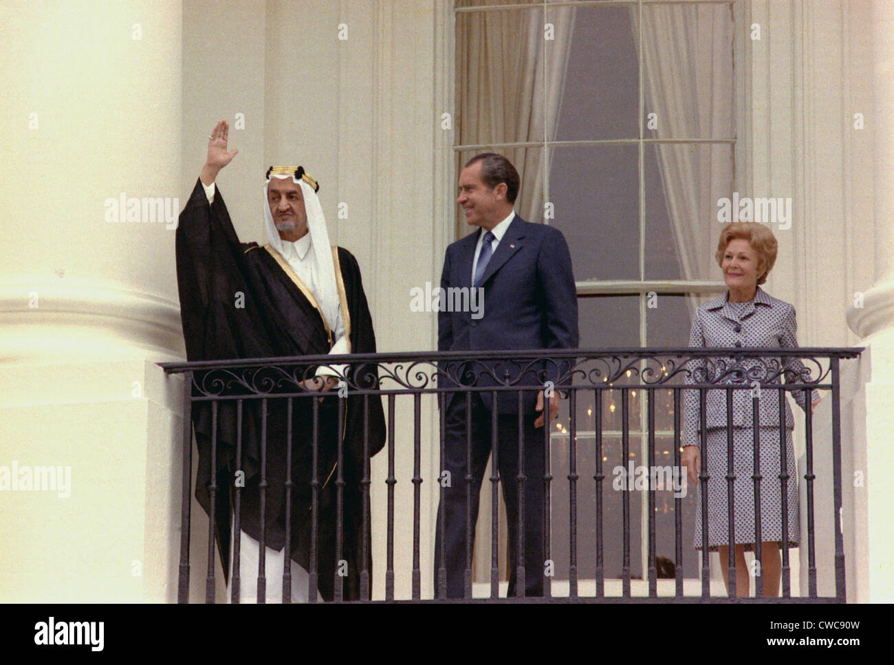 King Faisal of Saudi Arabia waves from the White House balcony after ...