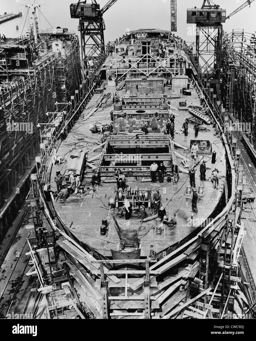 On the fourteenth day of the construction of a Liberty Ship. The upper ...