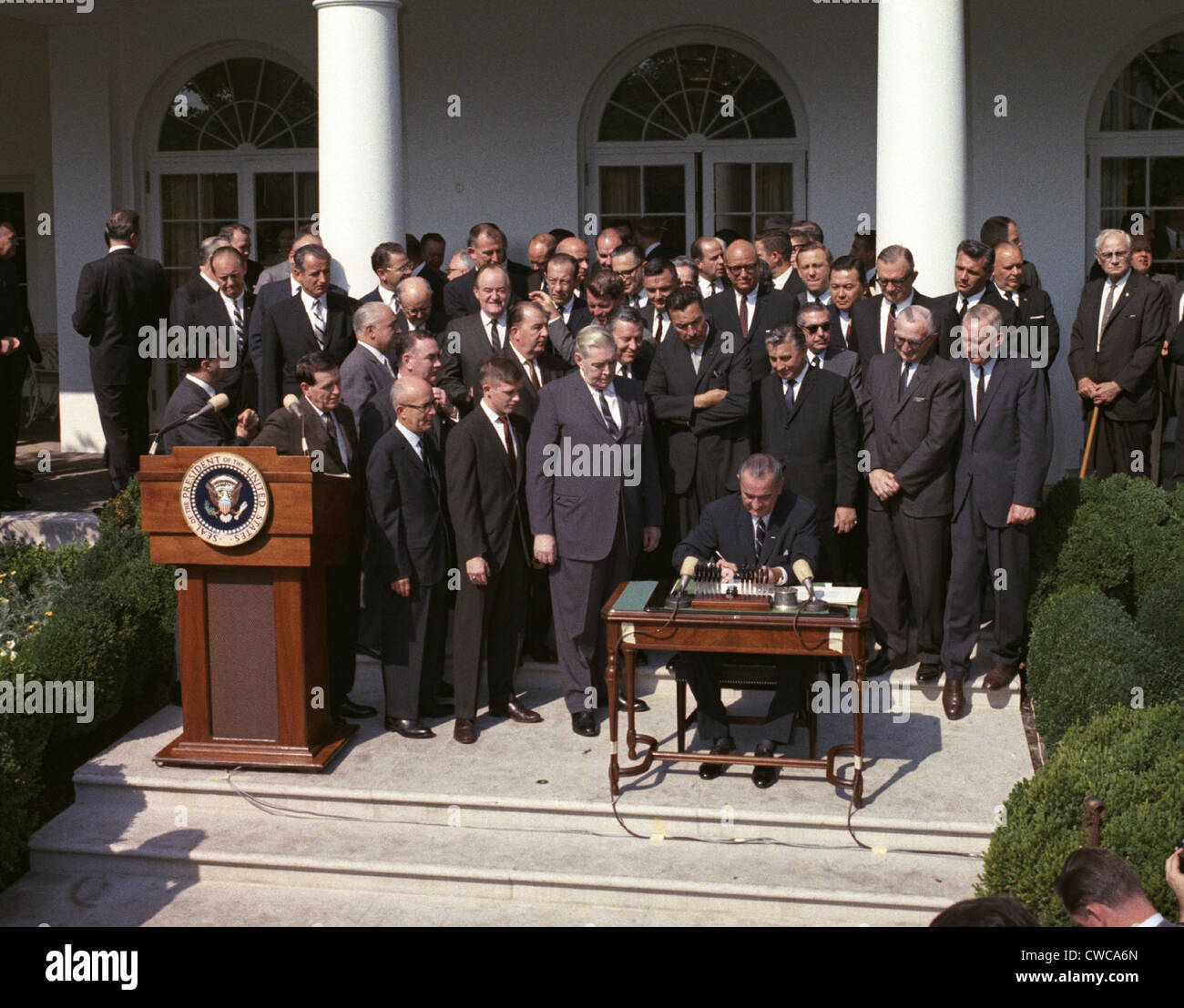 LBJ's War on Poverty. President Lyndon Johnson signing the Poverty Bill ...