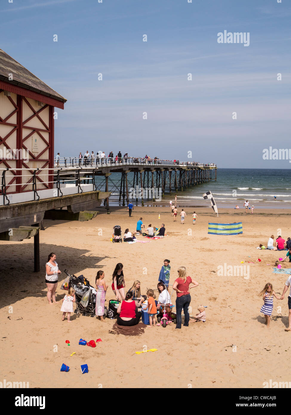 Saltburn-by-the-Sea Cleveland UK Families on the beach near the Pier ...