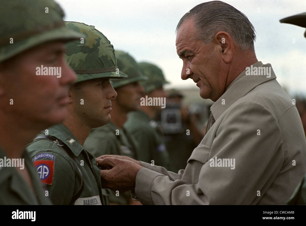 President Johnson in South Vietnam. LBJ awards the Distinguished ...