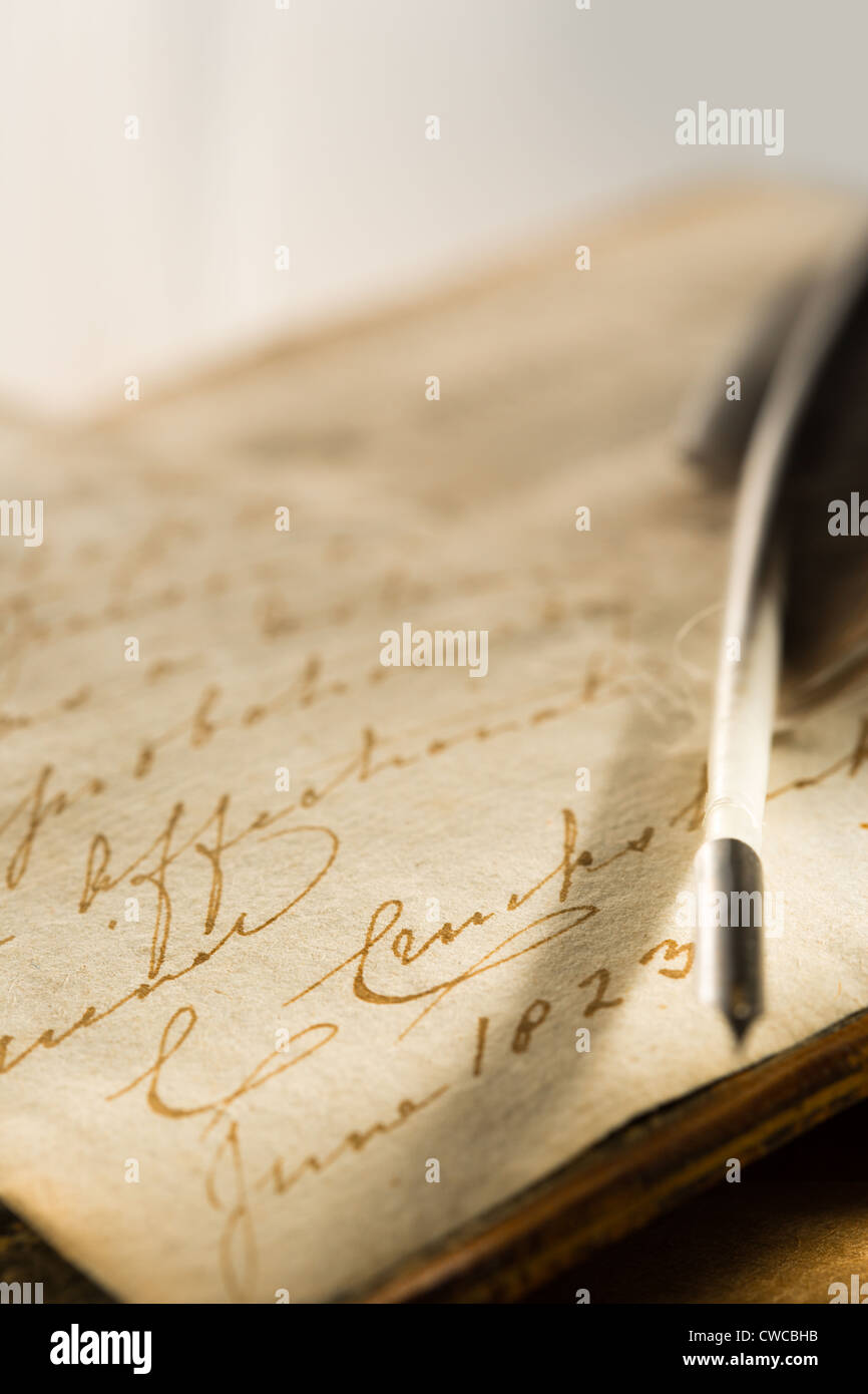 Old book with feather pen Stock Photo - Alamy Old book with feather pen Stock Photo - Alamy