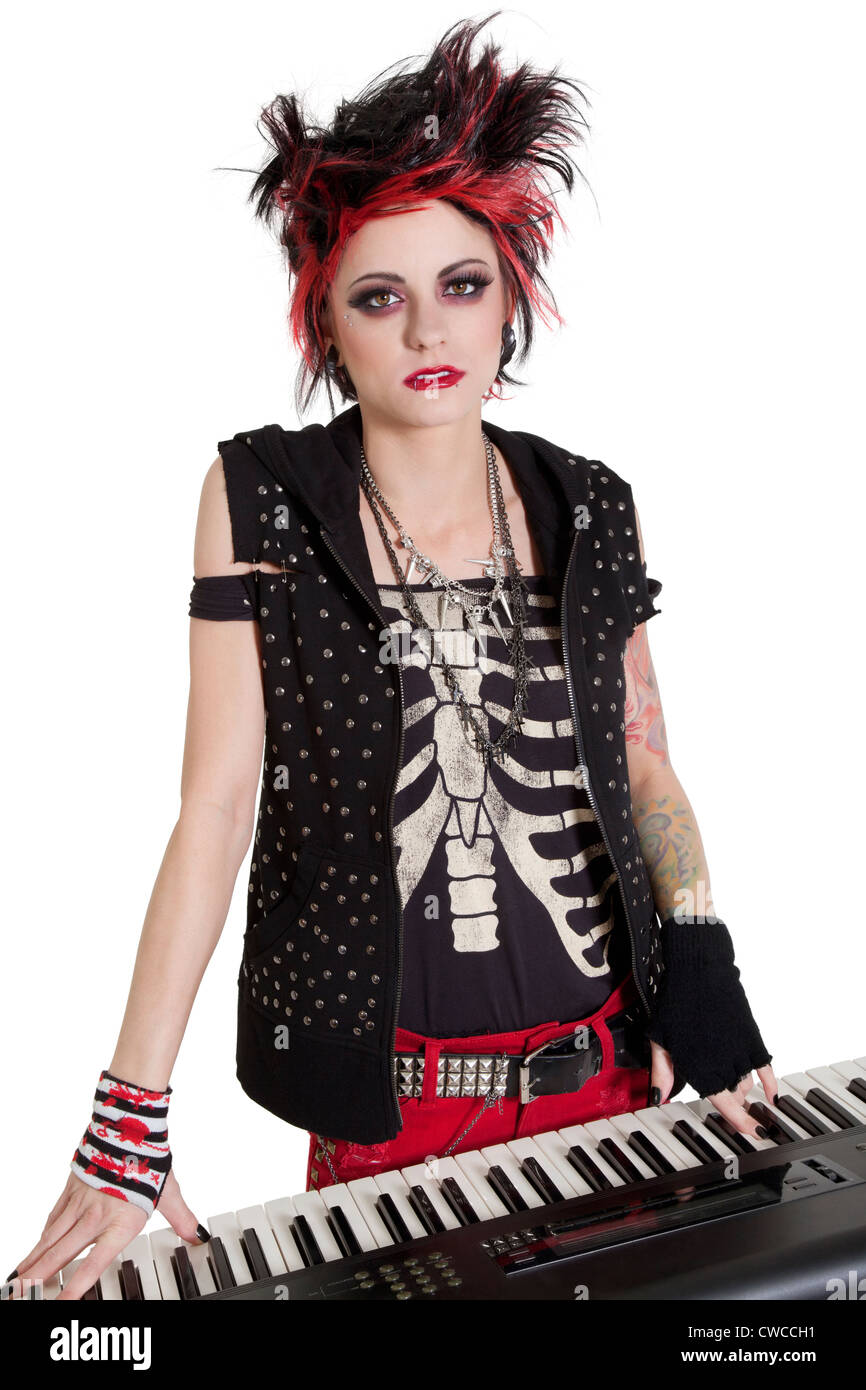 Portrait of rock woman with spiked hair and piano over white background ...