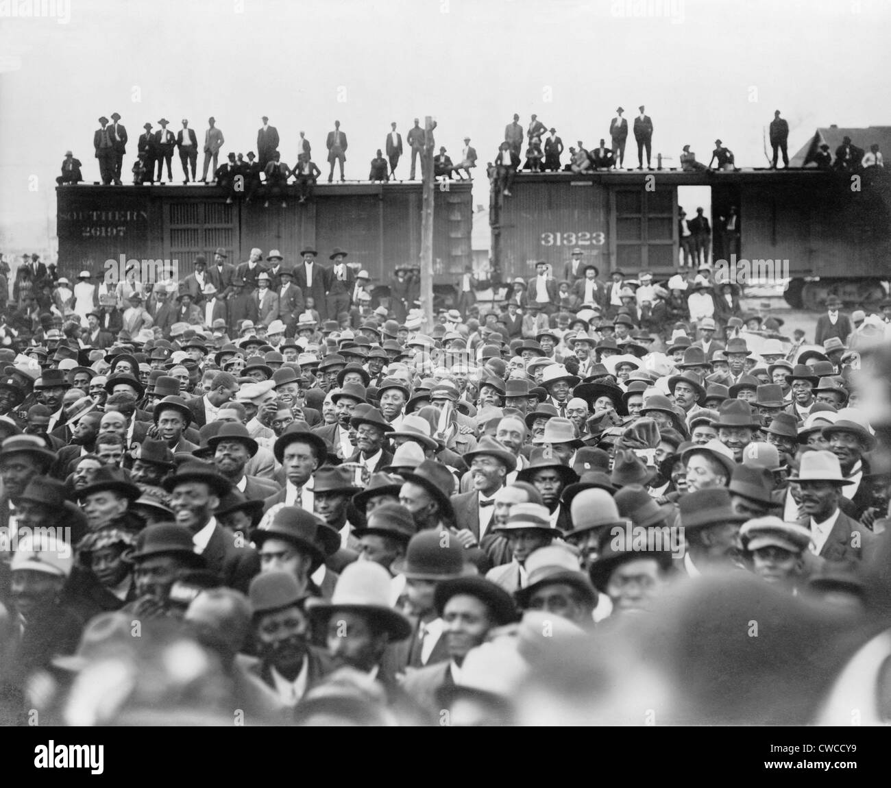 Listening to Booker T. Washington. An African American audience, some ...