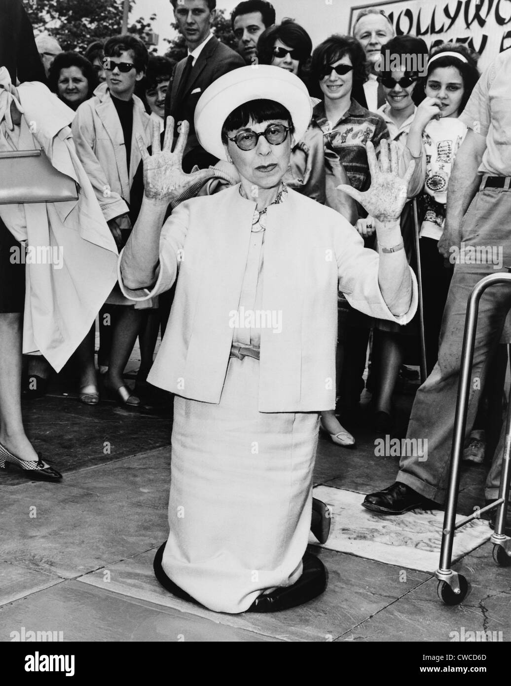 Edith Head, leaving hand prints in cement outside the Hollywood ...