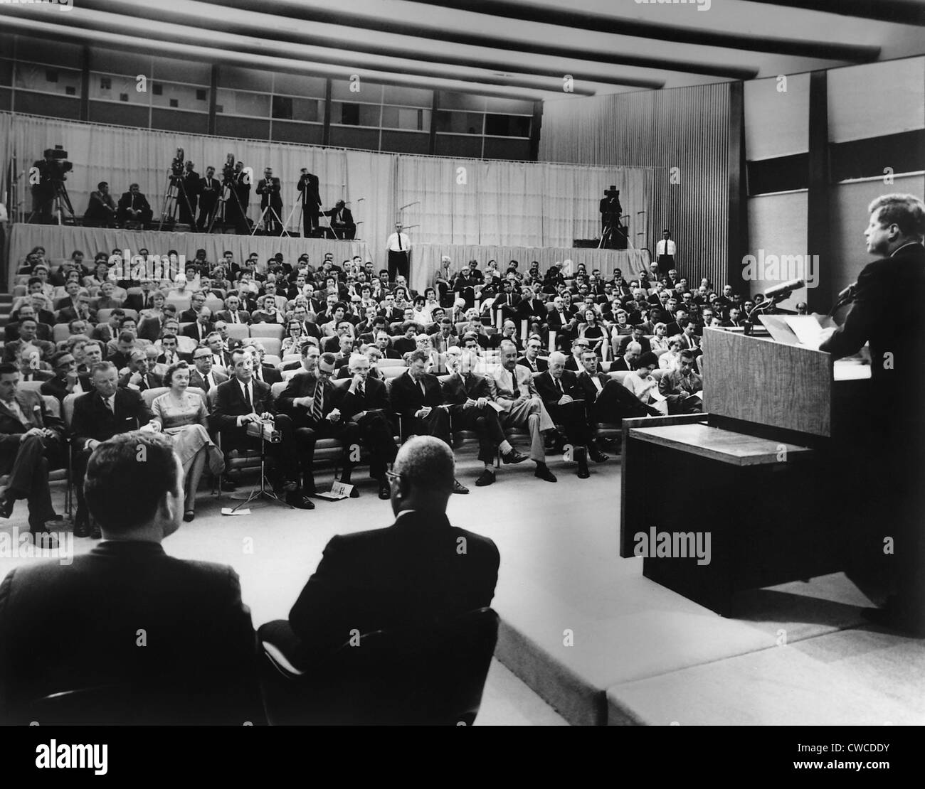 President John Kennedy speaks to reporters during a press conference ...