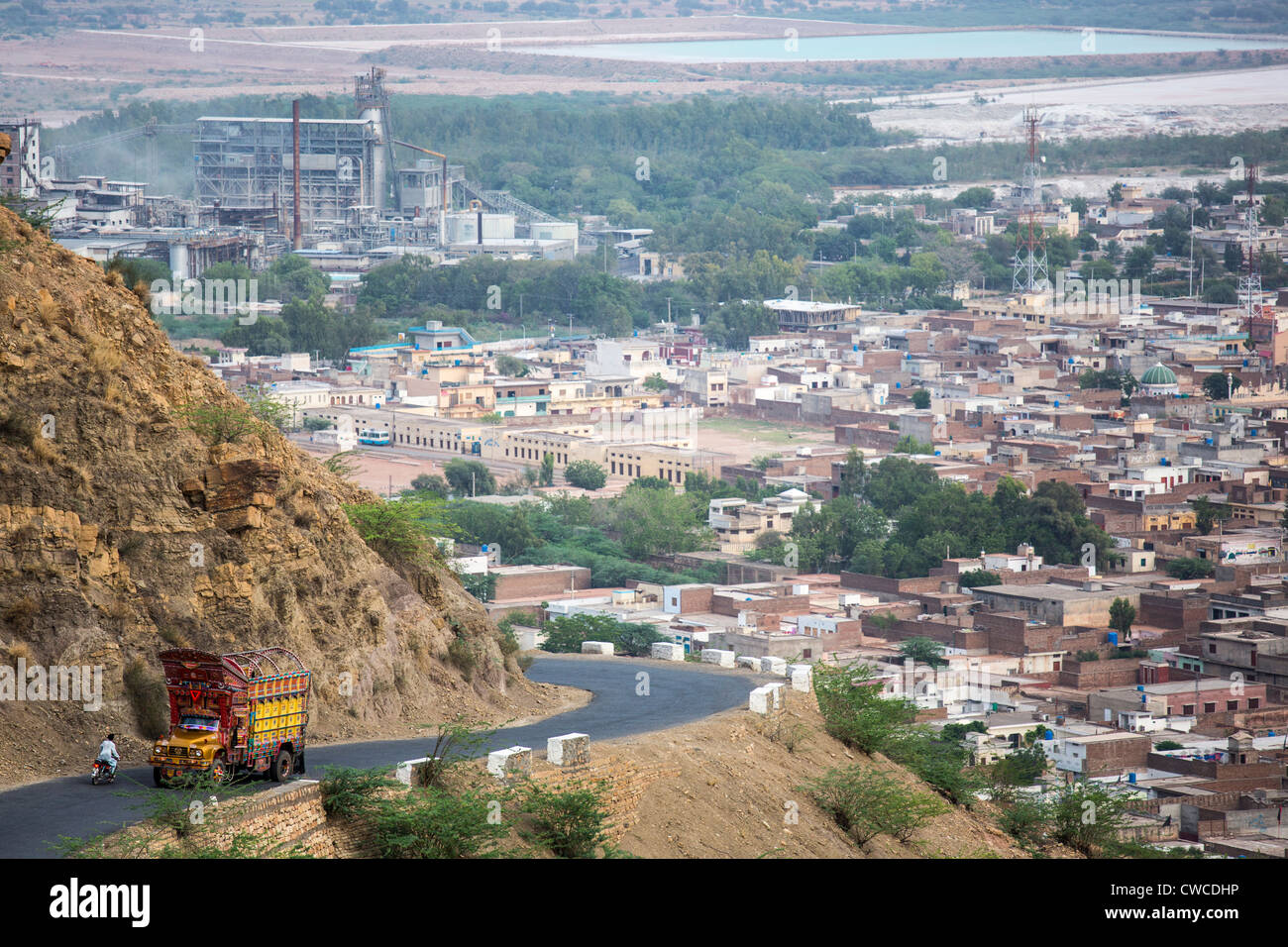 Jingle truck ascending next to the city of Khewra, Pakistan Stock Photo ...