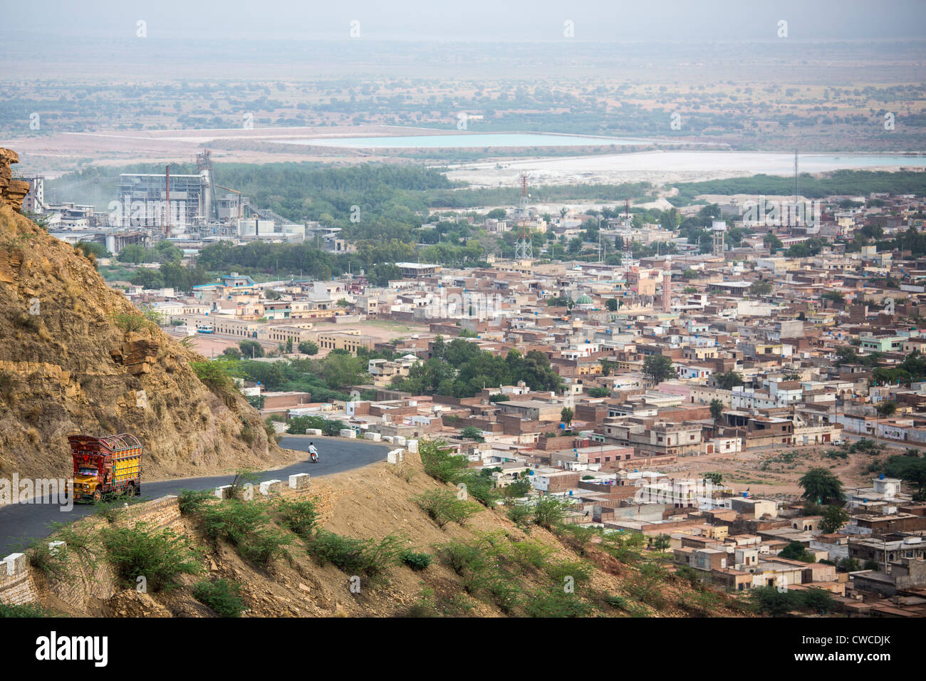 Jingle truck ascending next to the city of Khewra, Pakistan Stock Photo ...