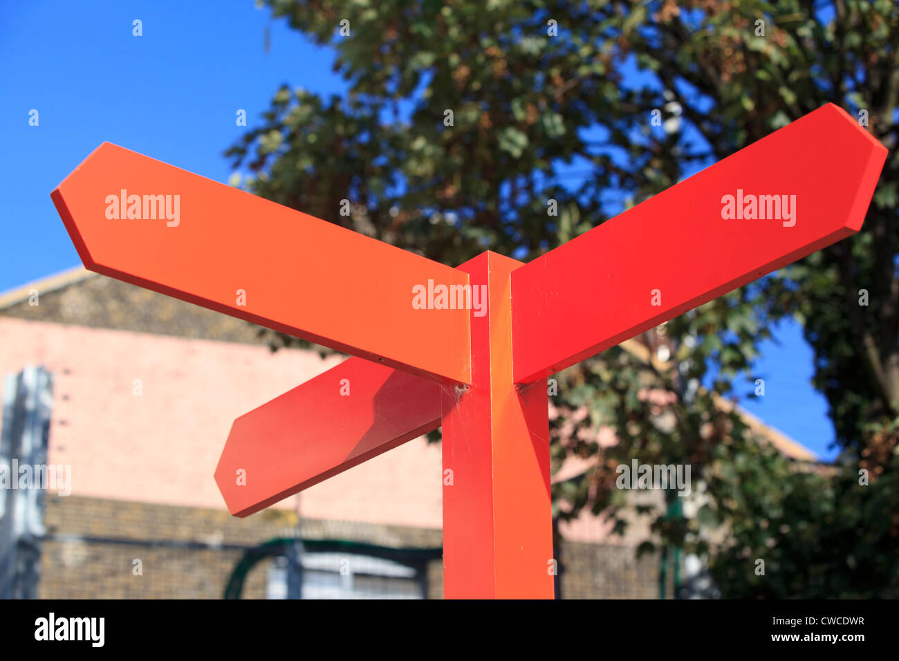 Blank red signpost Stock Photo - Alamy