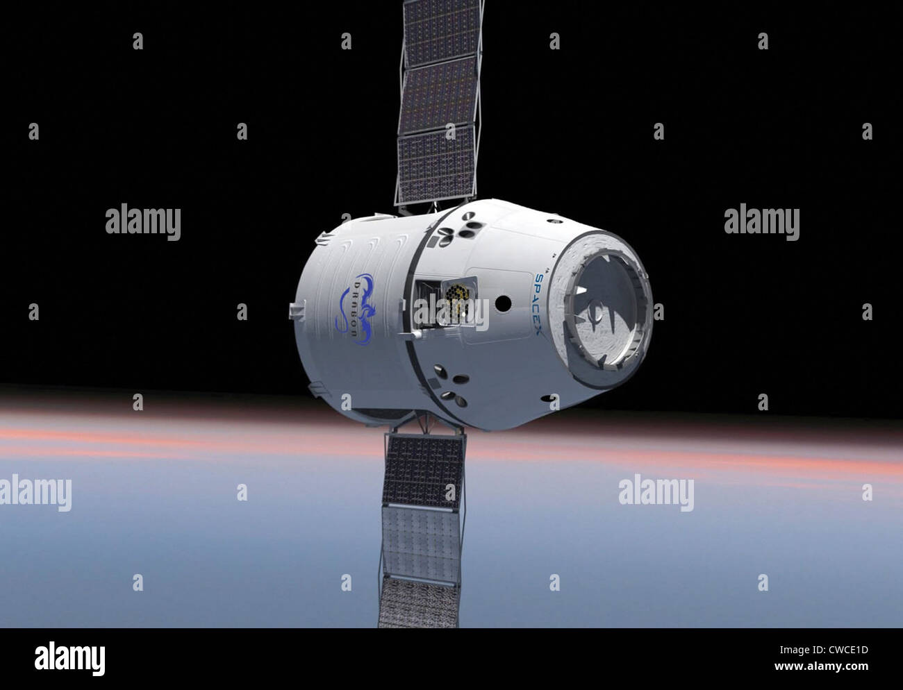 Artist's concept of the first Dragon Space capsule in orbit. The ...