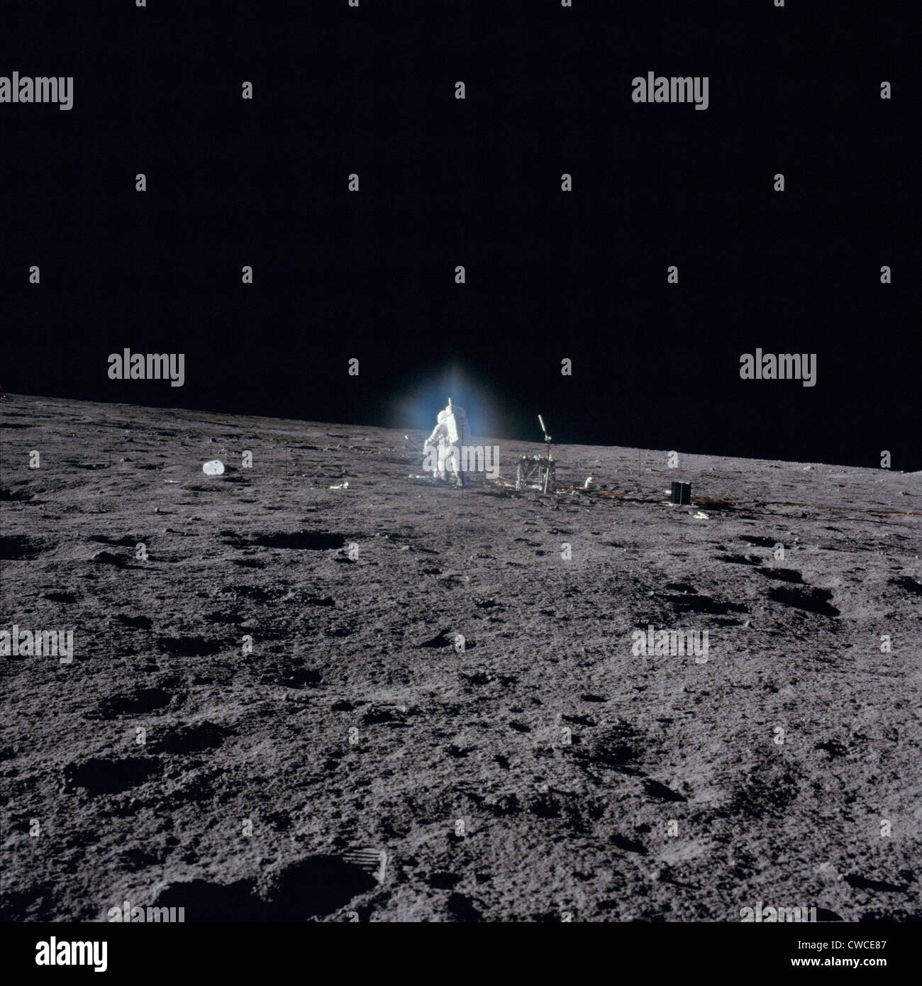 Apollo 12 Astronaut Alan Bean deploys scientific experiments on the ...