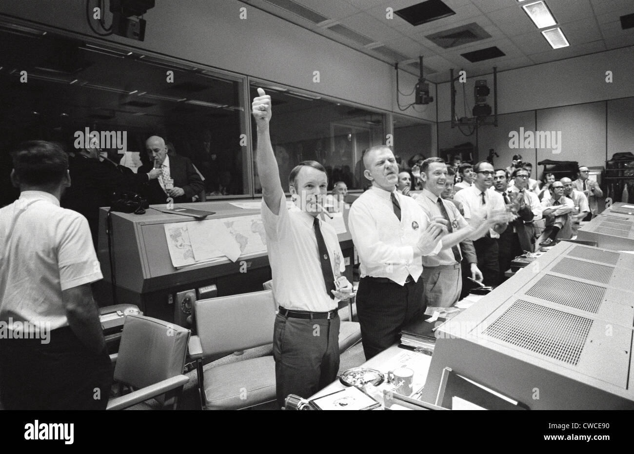 Apollo 13 Flight Directors applaud the successful splashdown of the ...