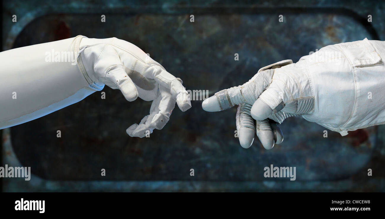 Robonaut hand (left), and a spacesuit-gloved human-hand. Called the ...