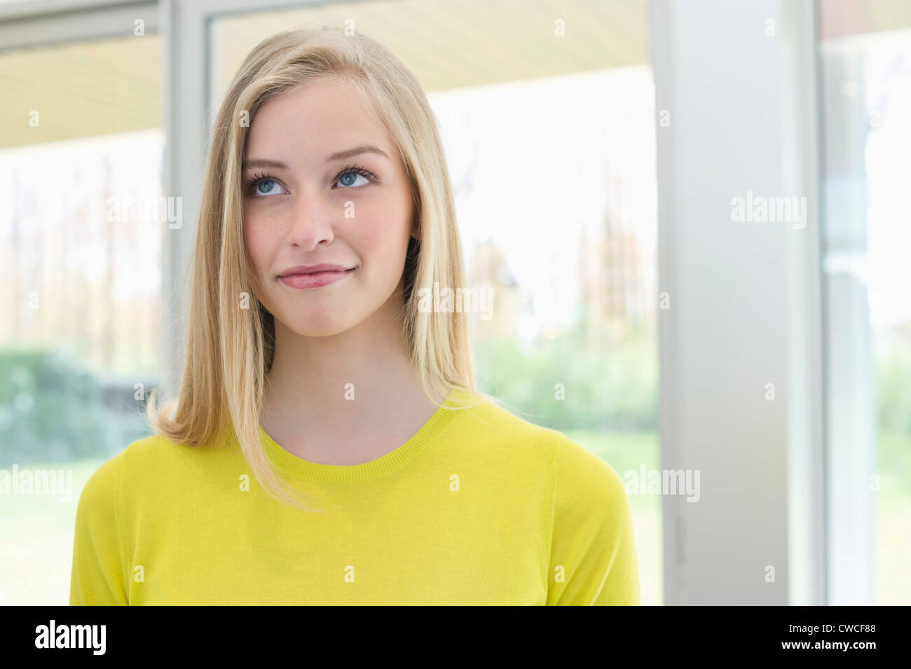 Close-up of a woman smiling Stock Photo - Alamy