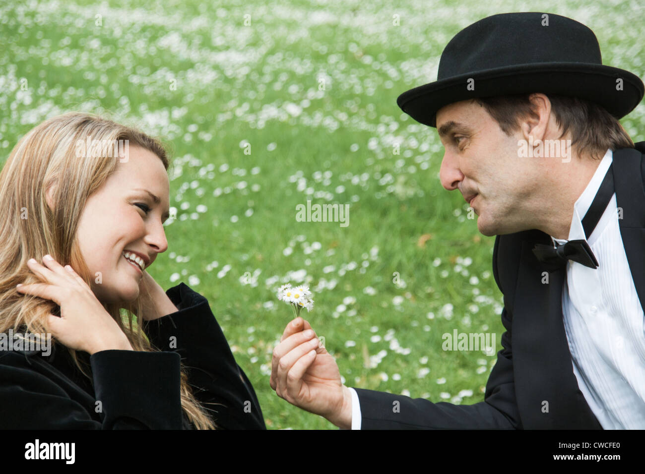 Man with daisies hi-res stock photography and images - Alamy