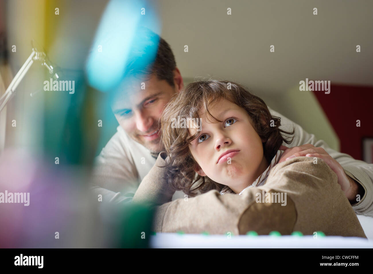 Boy thinking studying father home hi-res stock photography and images ...