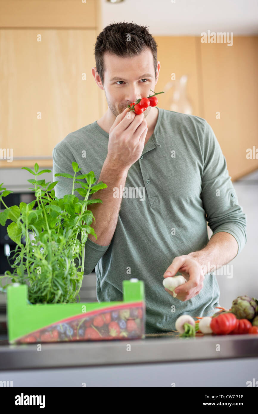 Man preparing food in the kitchen Stock Photo - Alamy