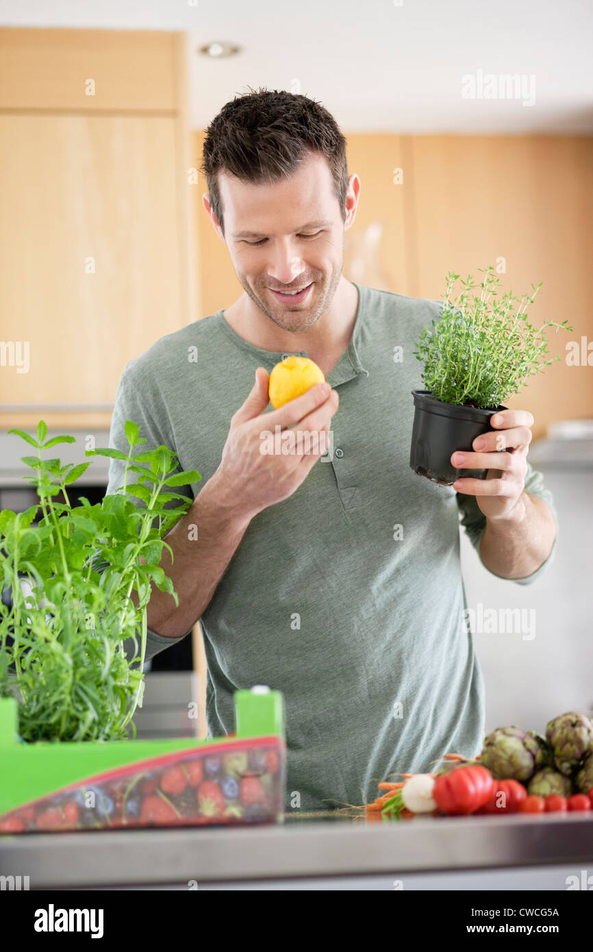 Man preparing food in the kitchen Stock Photo - Alamy