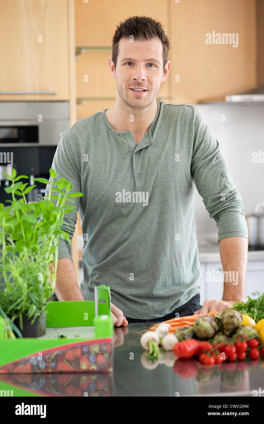 Man preparing food in the kitchen Stock Photo - Alamy